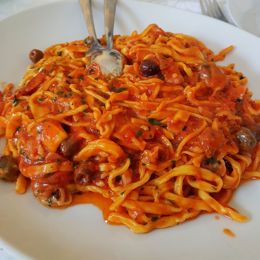 Tagliolini pasta alla Langarola with sausage, chicken liver and porcini ...